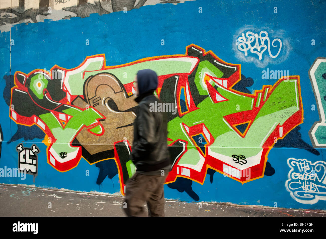 Graffiti paintings wall profile silhouette mural hi-res stock ...