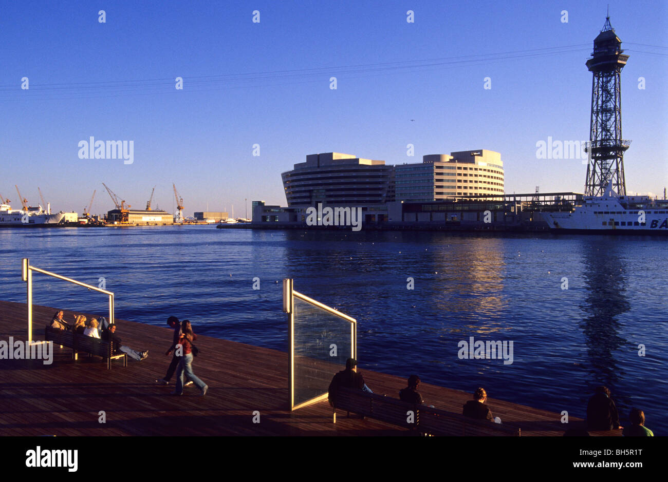 People at Rambla del Mar, World Trade Center in background, Barcelona ...