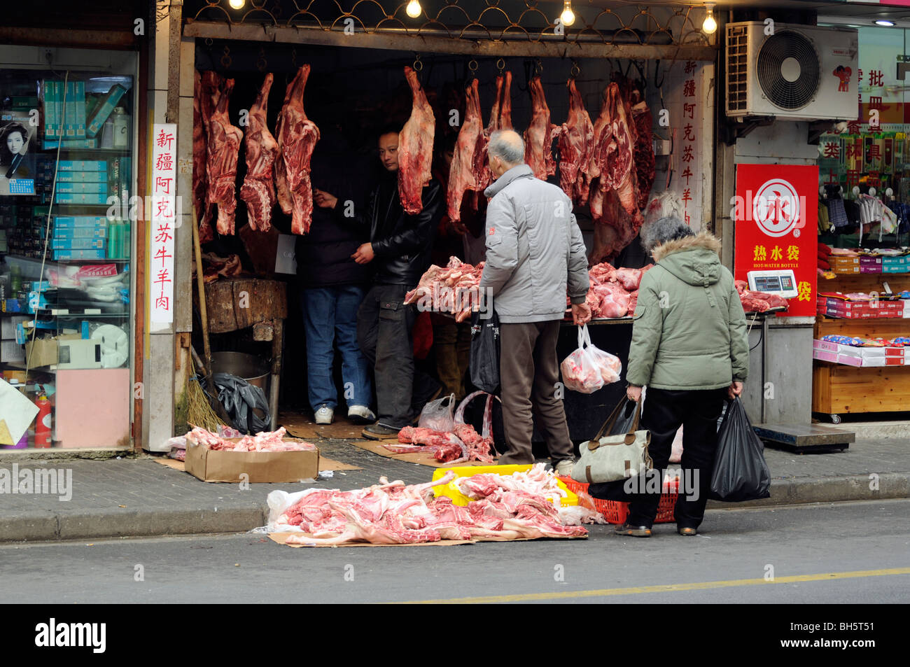 Chinese butcher shop hi-res stock photography and images - Alamy