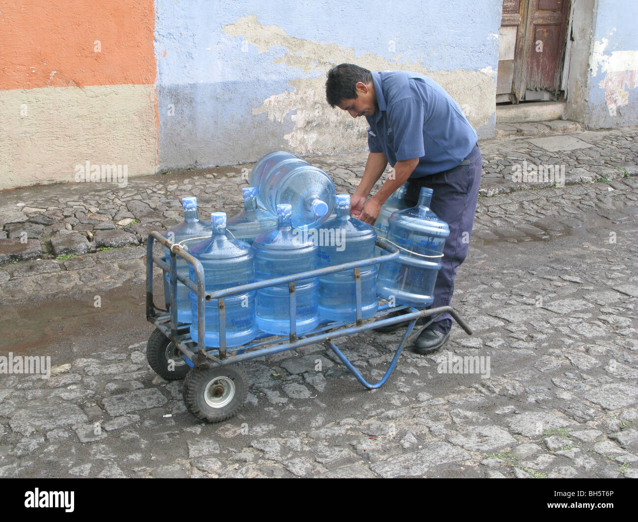 GUATEMALA Bottled water vendor in the streets of Antigua Photo Julio ...