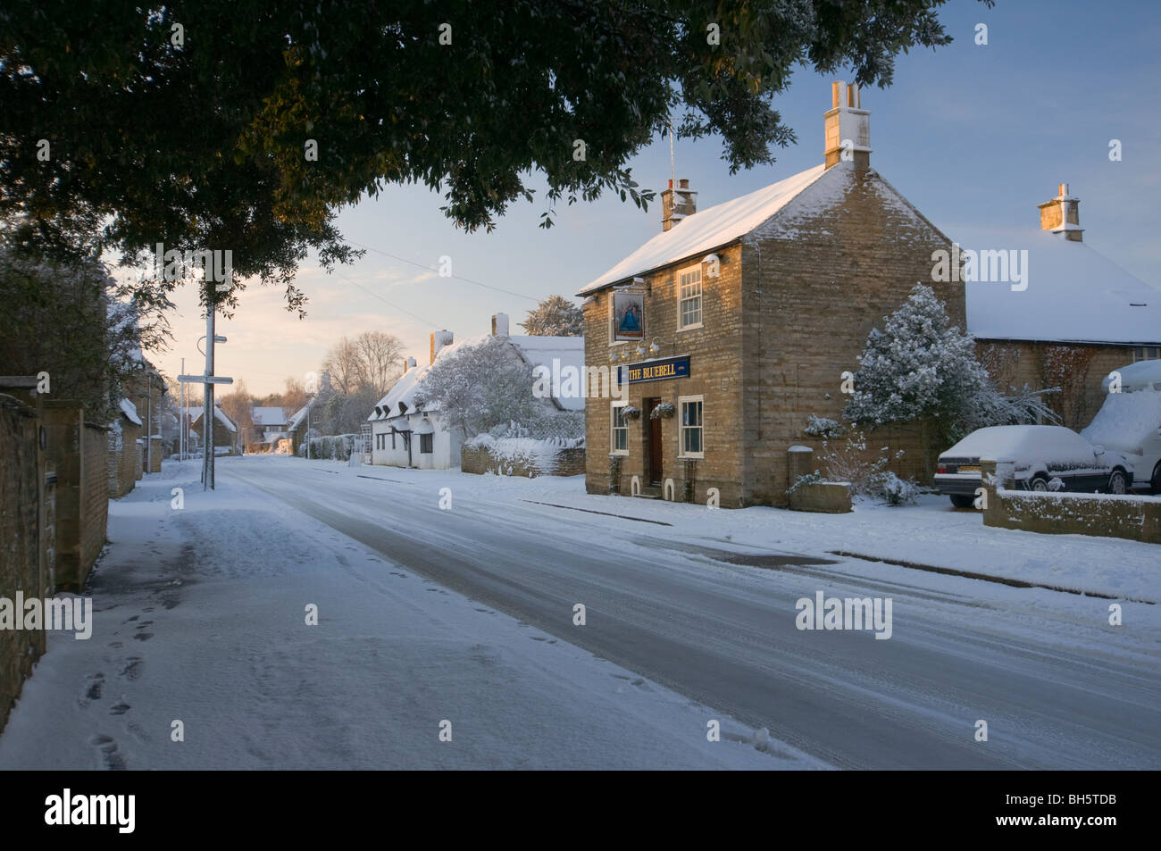 The Bluebell Inn and John Clare Cottage in Helpston on a snowy winters ...
