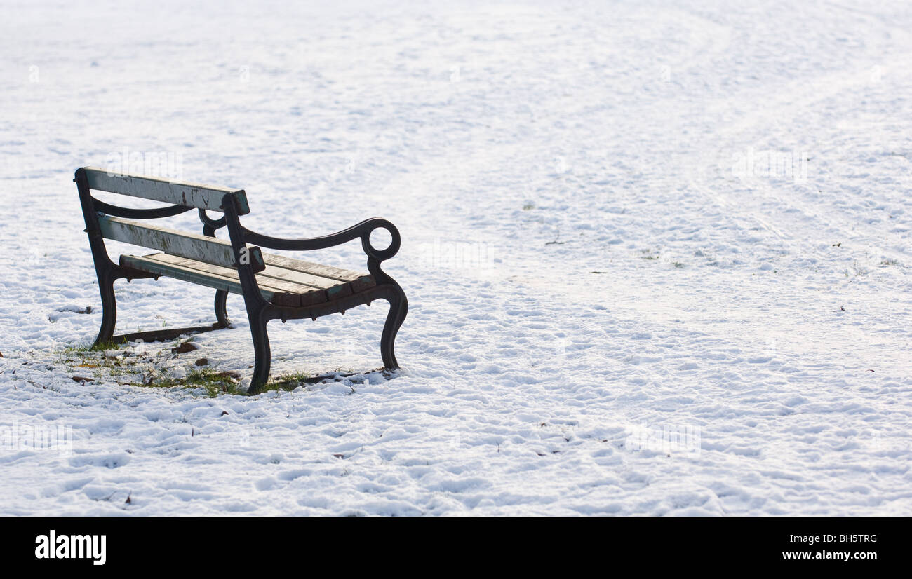 Snow covered empty park benches Stock Photo - Alamy