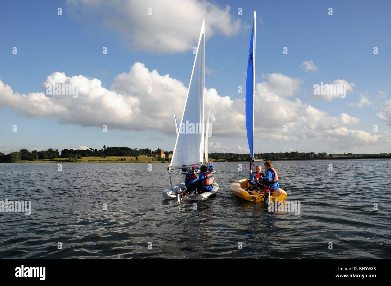 CHildren in sailing dingies on a lake, UK Stock Photo - Alamy