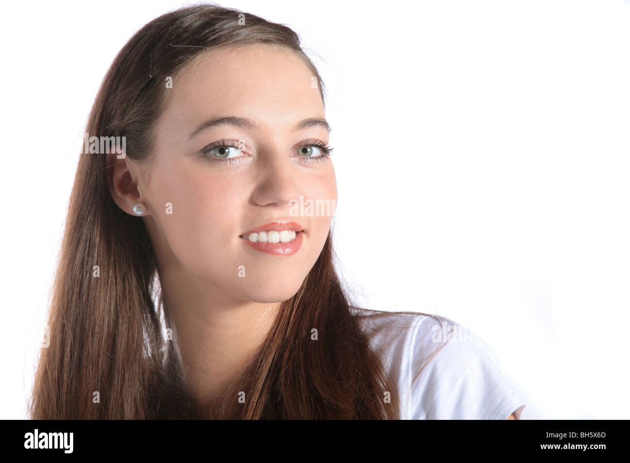 An attractive young woman smiling. All isolated on white background ...