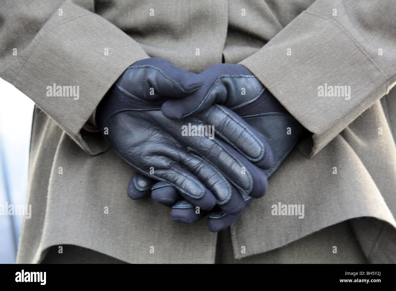 Despite light rain and a chilling breeze, Marines and sailors man the ...