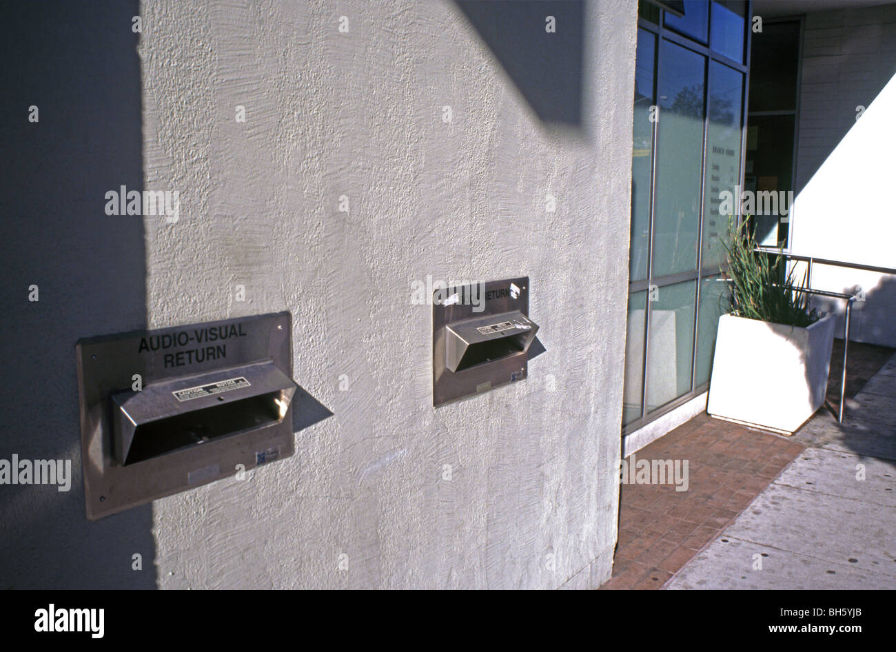 Library outside audio-visual and book return slots Stock Photo - Alamy