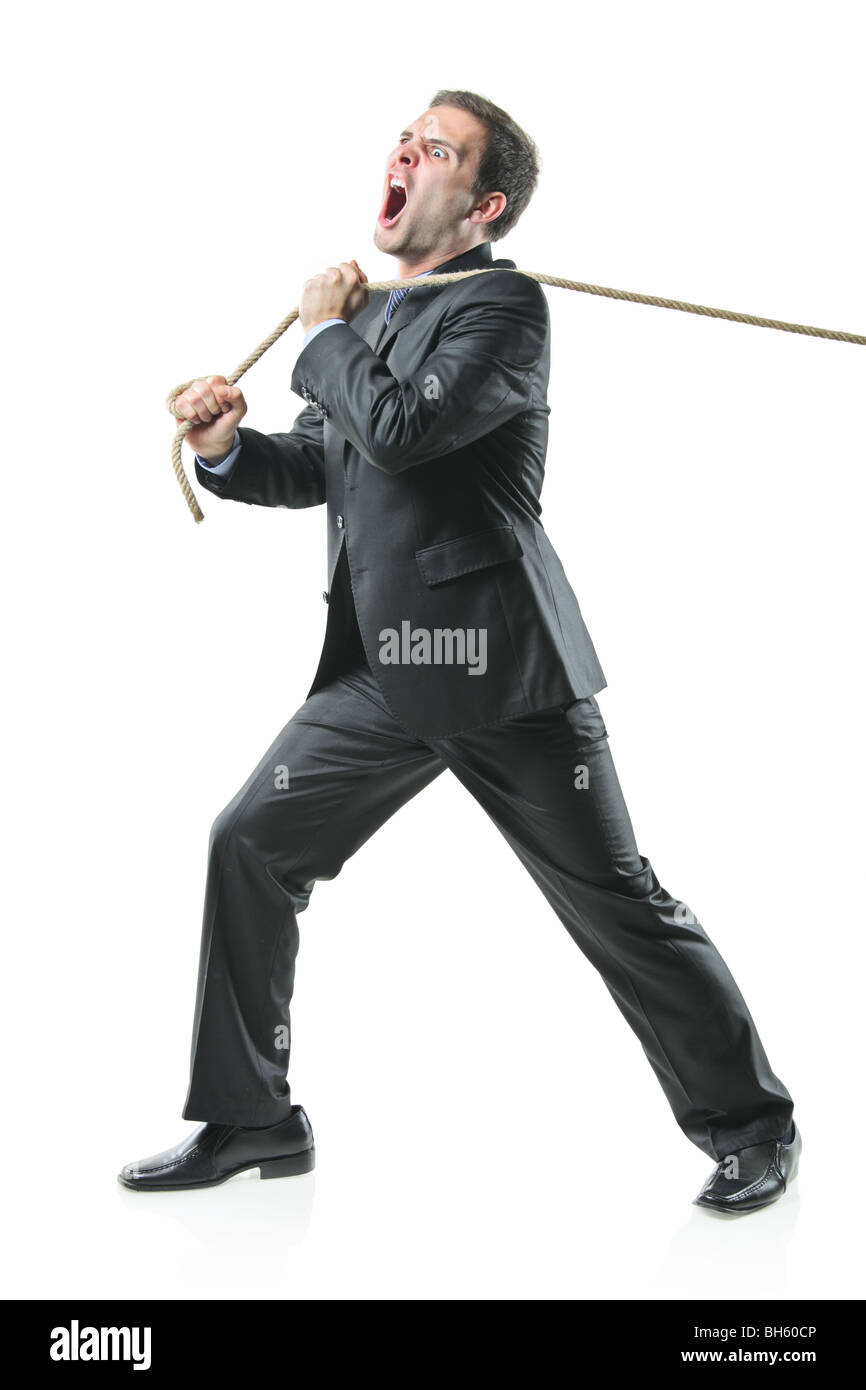 Businessman pulling a rope, isolated on white background Stock Photo ...