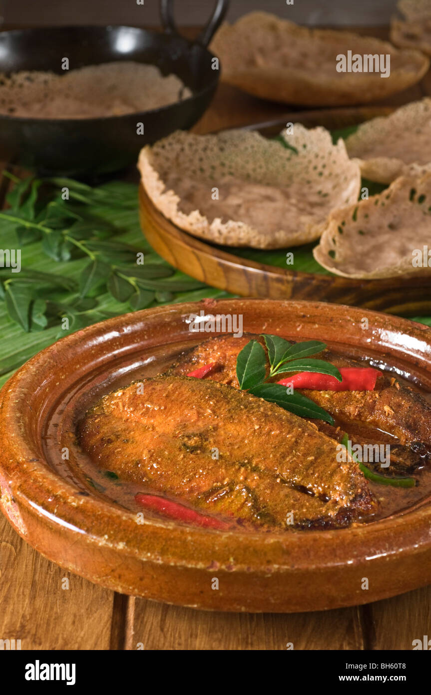 Kerala fish curry with appams South India food Stock Photo - Alamy