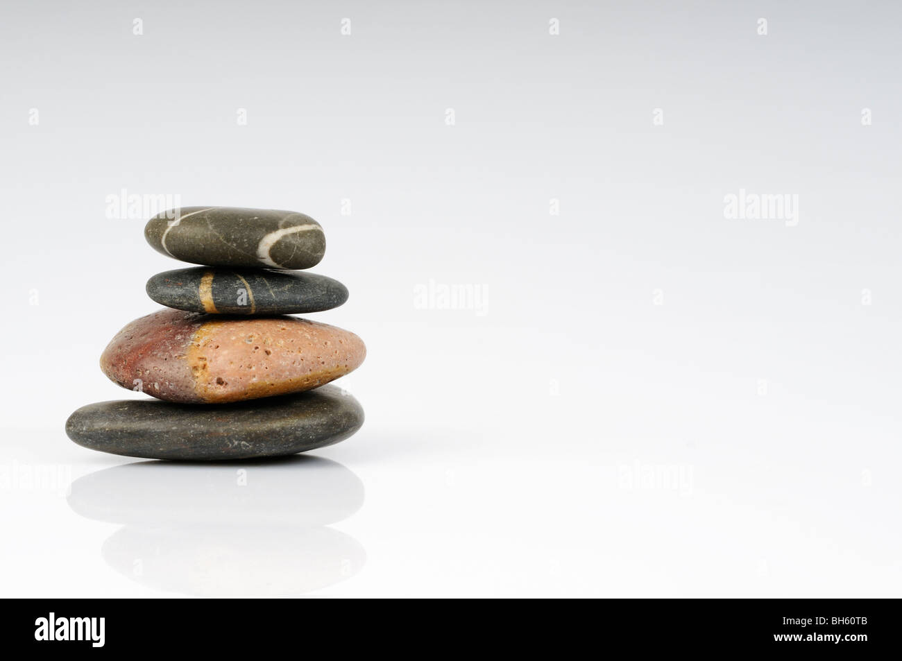 Pebbles balanced on top of each other hi-res stock photography and ...