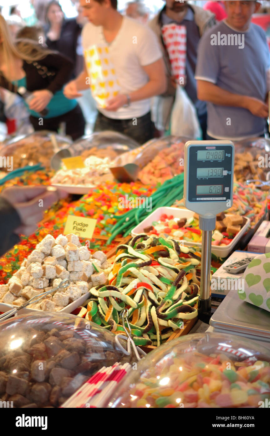 market stall selling sweets or candy Stock Photo - Alamy