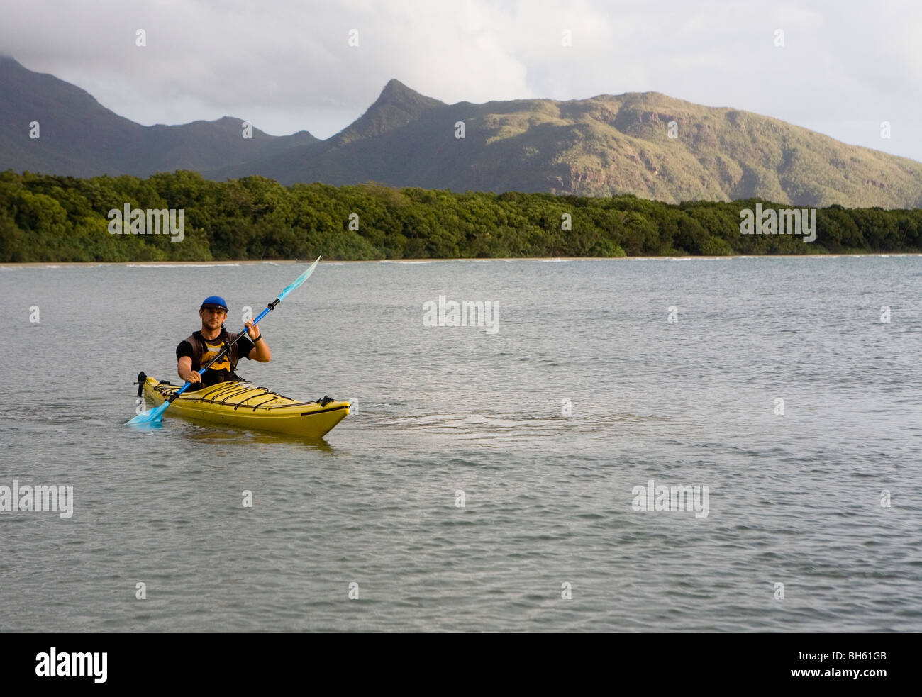Paddling in Zoe Bay on Hinchinbrook Island Stock Photo - Alamy