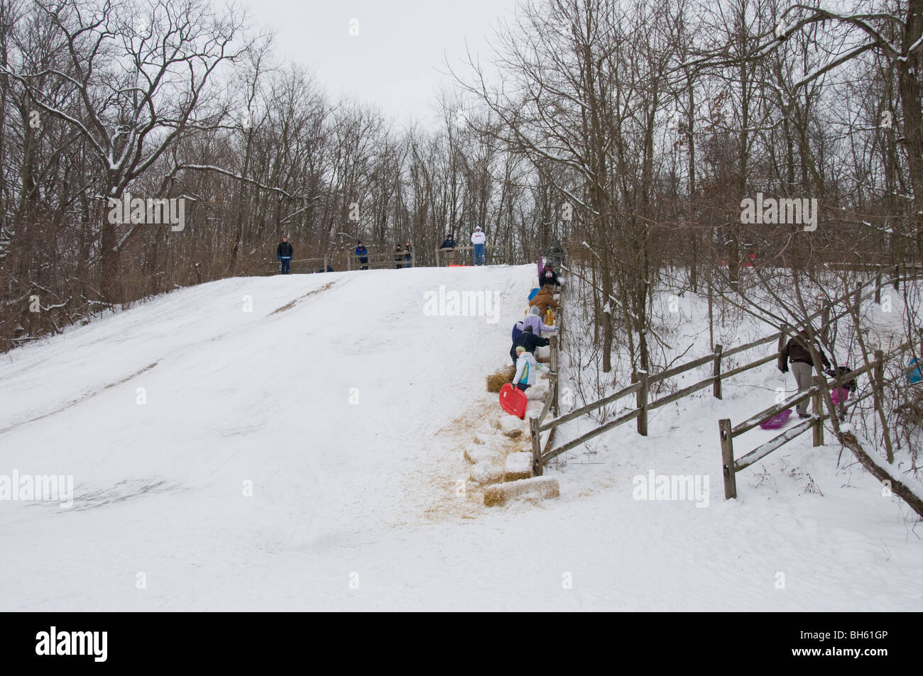 Children sledding hill hi-res stock photography and images - Alamy