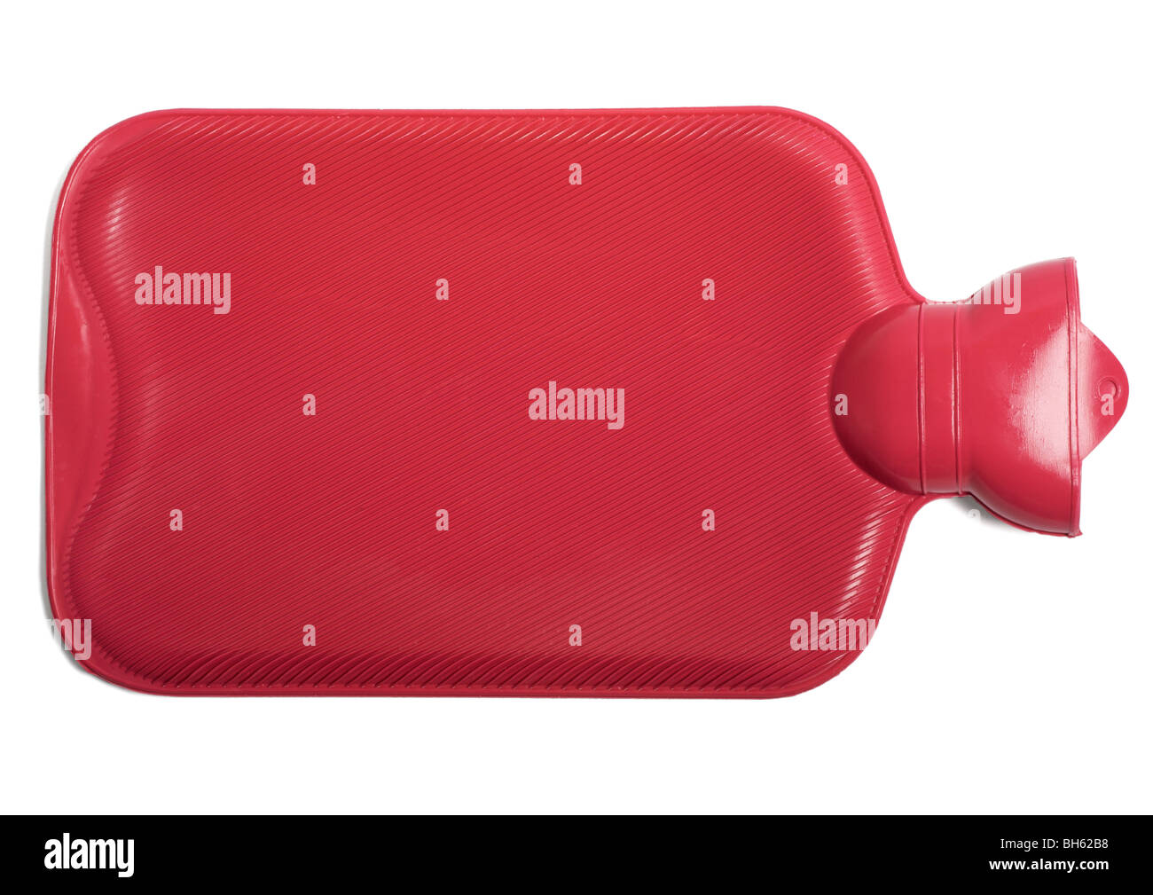 Red hot water bottle on white background Stock Photo - Alamy