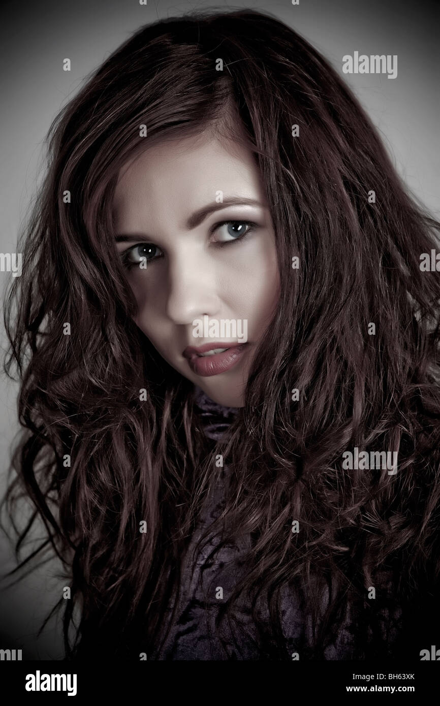 Beautiful young lady in studio. Portrait Stock Photo - Alamy