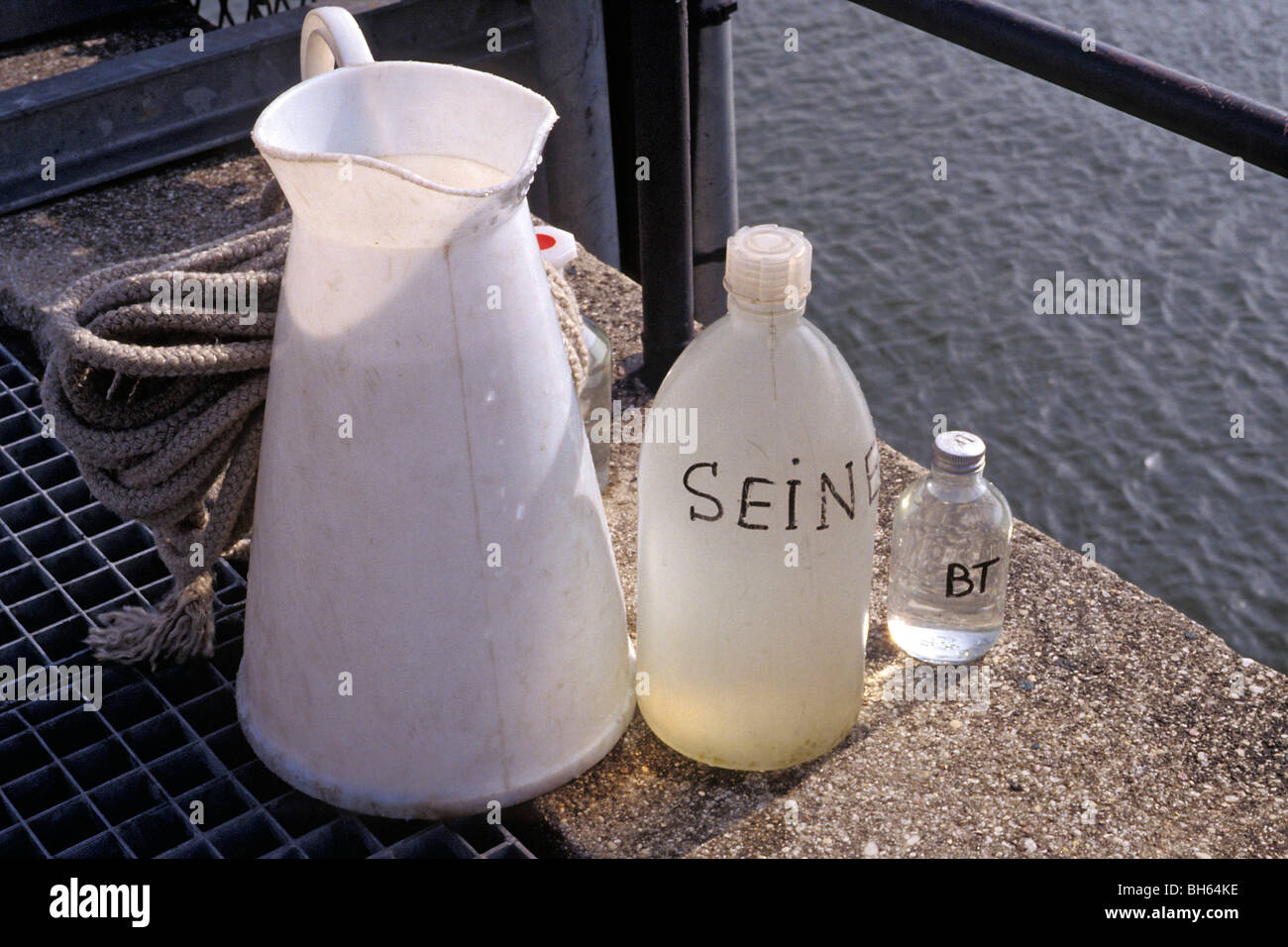 TAKING A WATER SAMPLE FROM THE SEINE, TEST OF WATER QUALITY AND ...