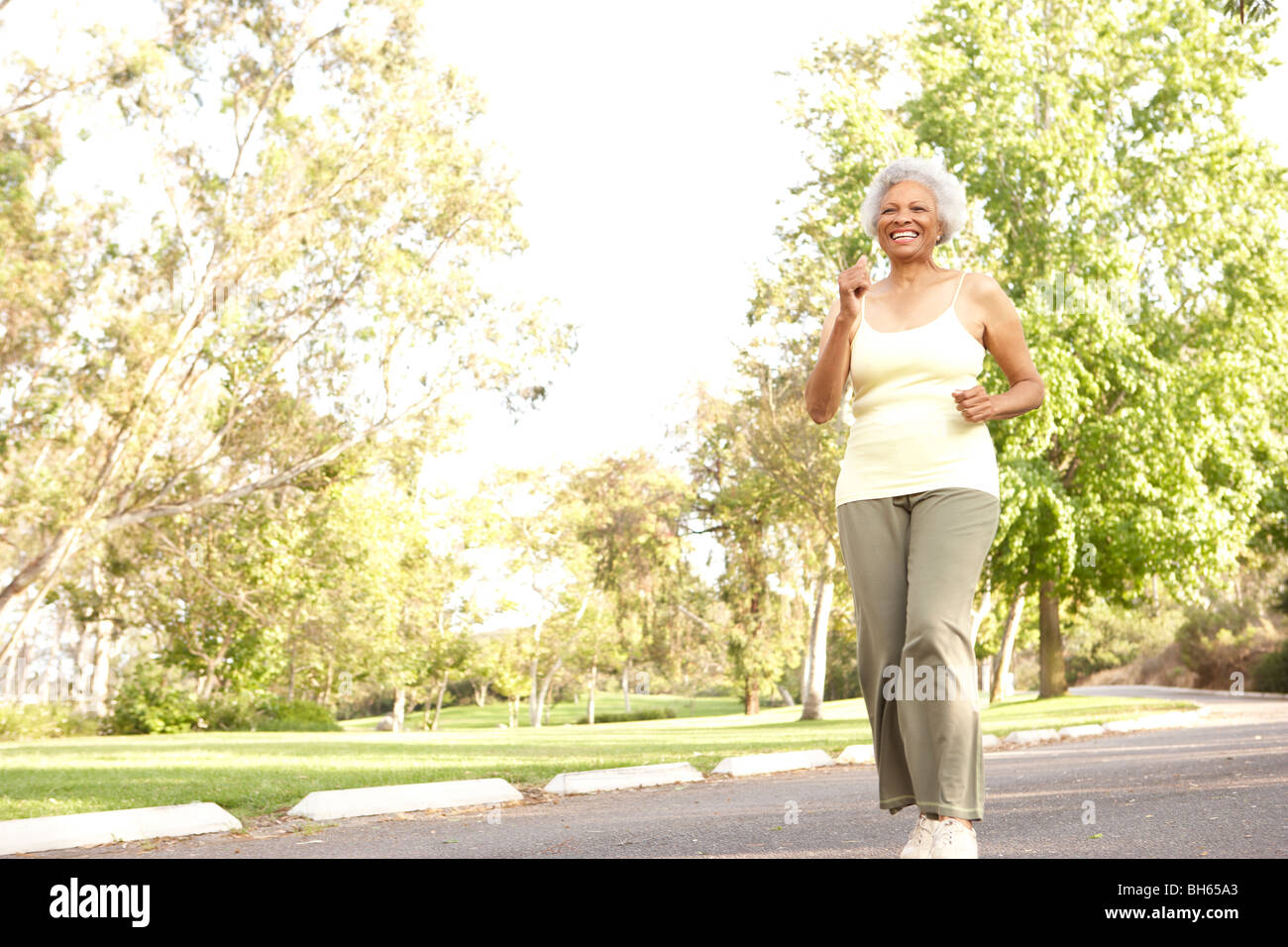 Older woman jogging african american hi-res stock photography and ...