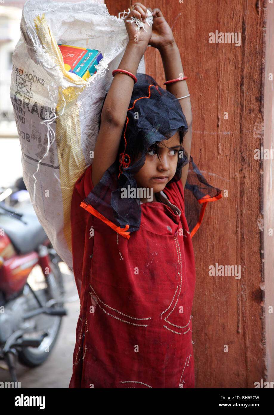 Girl collecting waste, Jaipur Stock Photo - Alamy