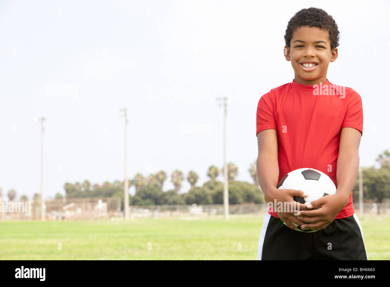 Boy wearing football kit hi-res stock photography and images - Alamy