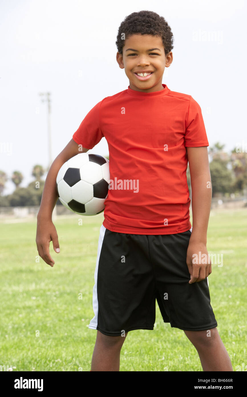 Boy wearing football kit hi-res stock photography and images - Alamy