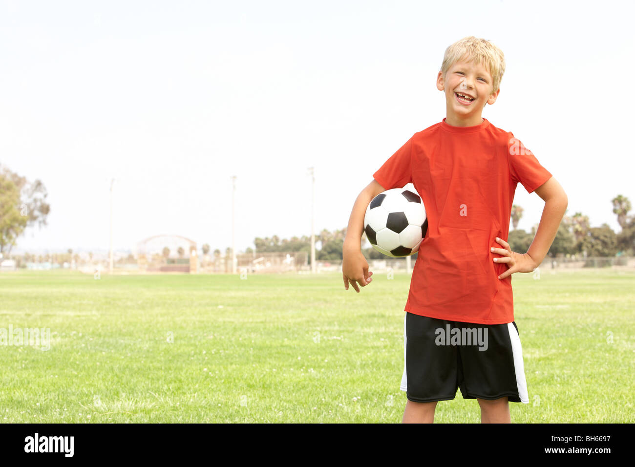 Boy wearing football kit hi-res stock photography and images - Alamy