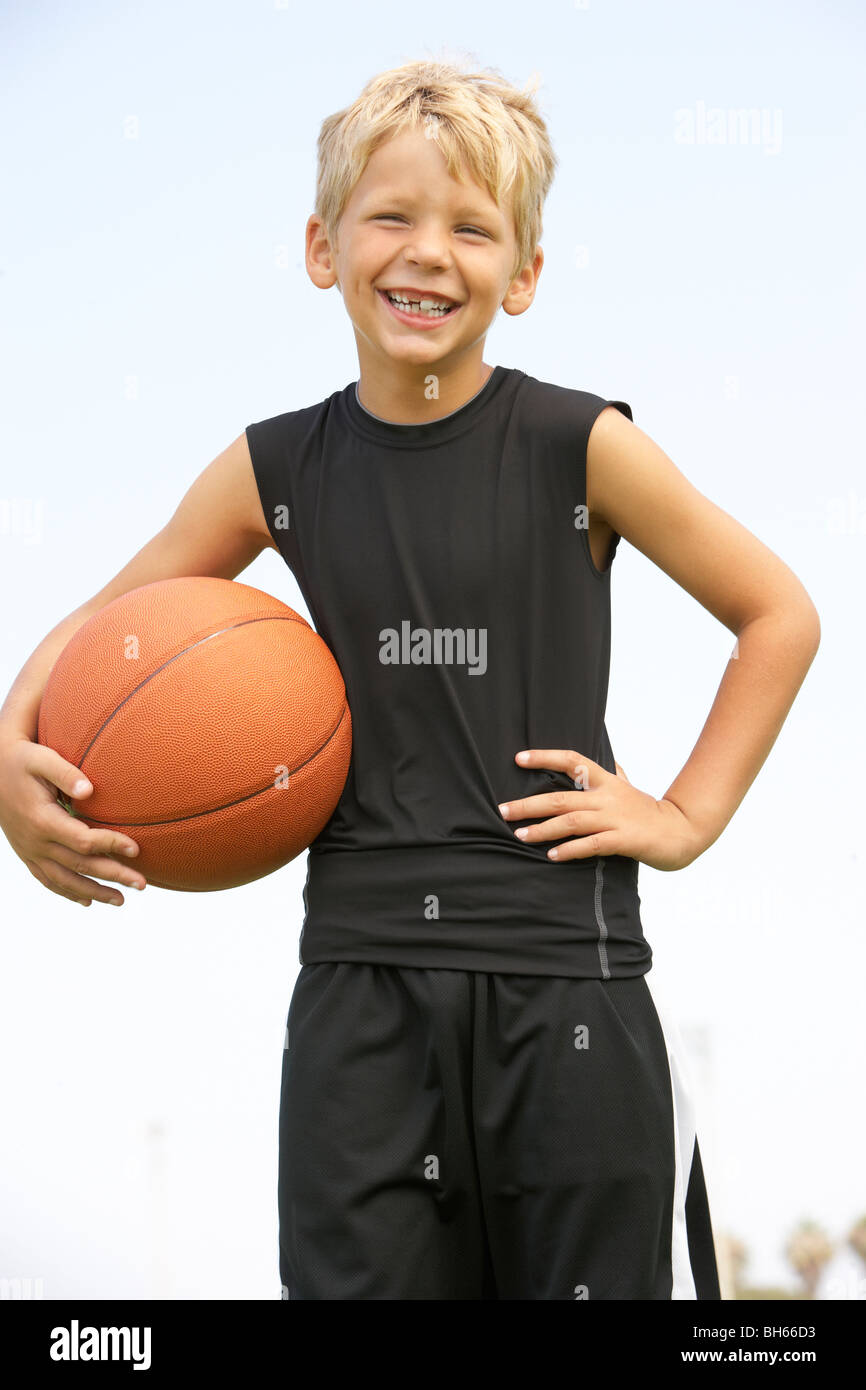 Young Boy Playing Basketball Stock Photo - Alamy