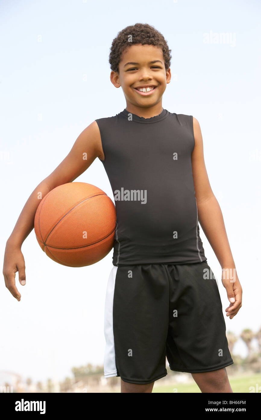 Young Boy Playing Basketball Stock Photo - Alamy