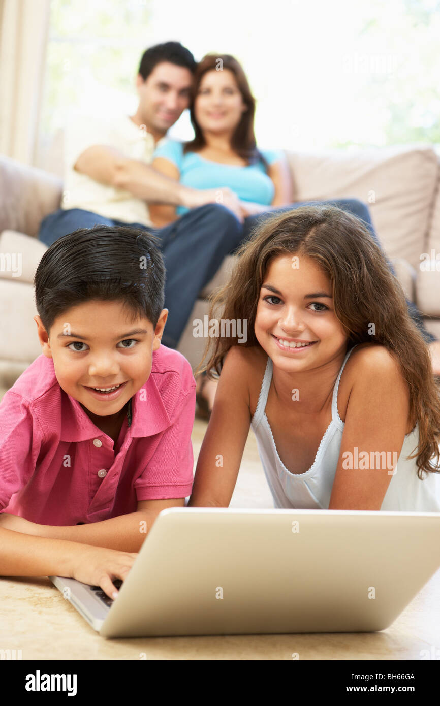 Children Using Laptop At Home Stock Photo - Alamy
