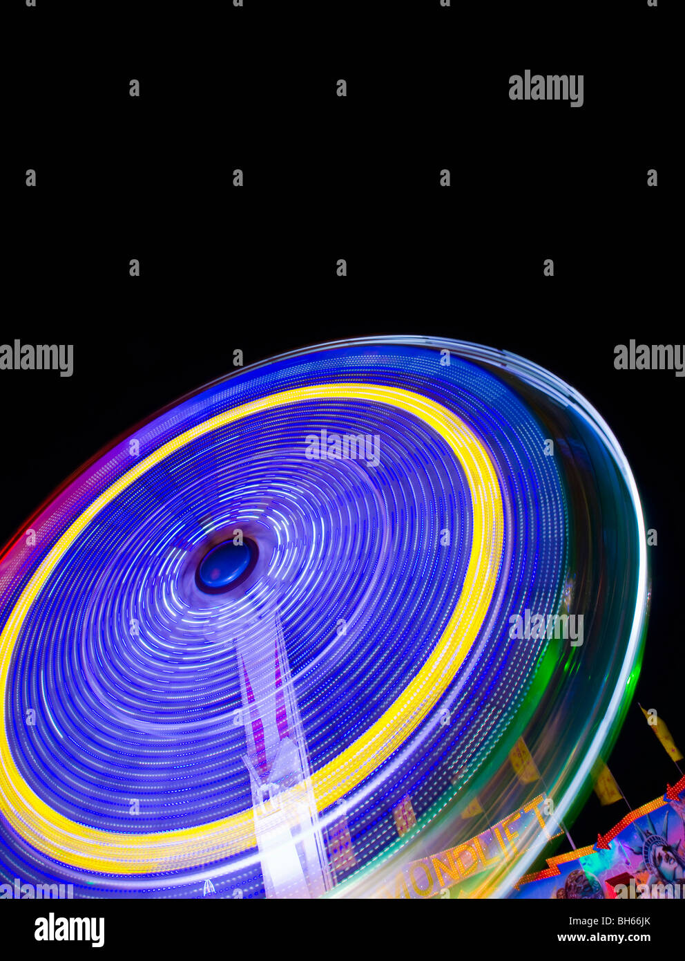 amusement park ride at night Stock Photo - Alamy