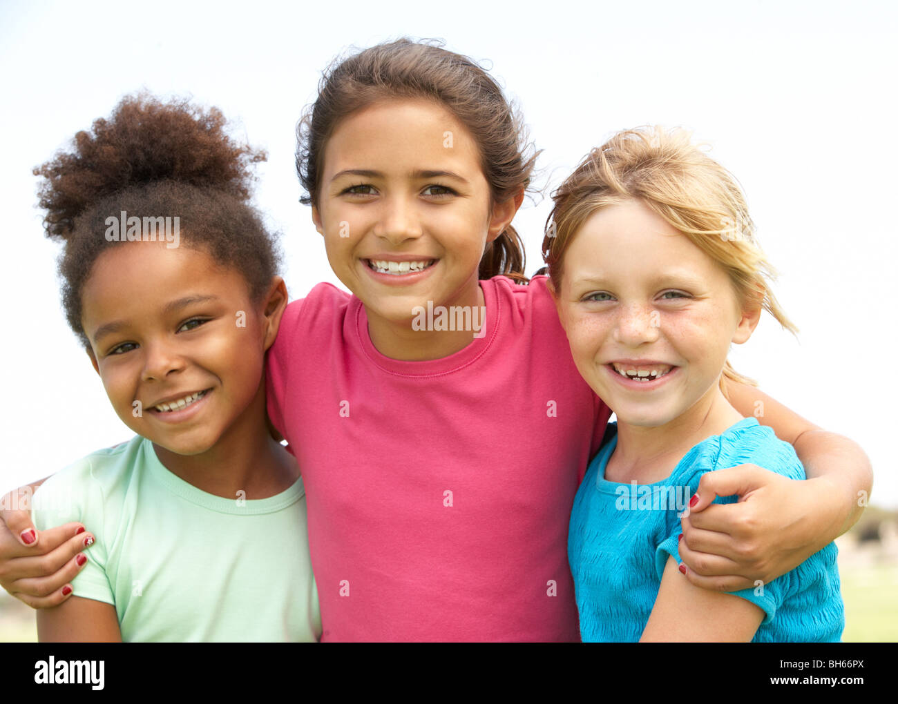 Young Girls In Playing In Park Stock Photo - Alamy