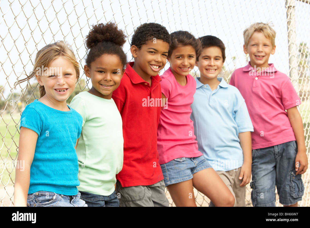 Group Of Children Playing In Park Stock Photo - Alamy