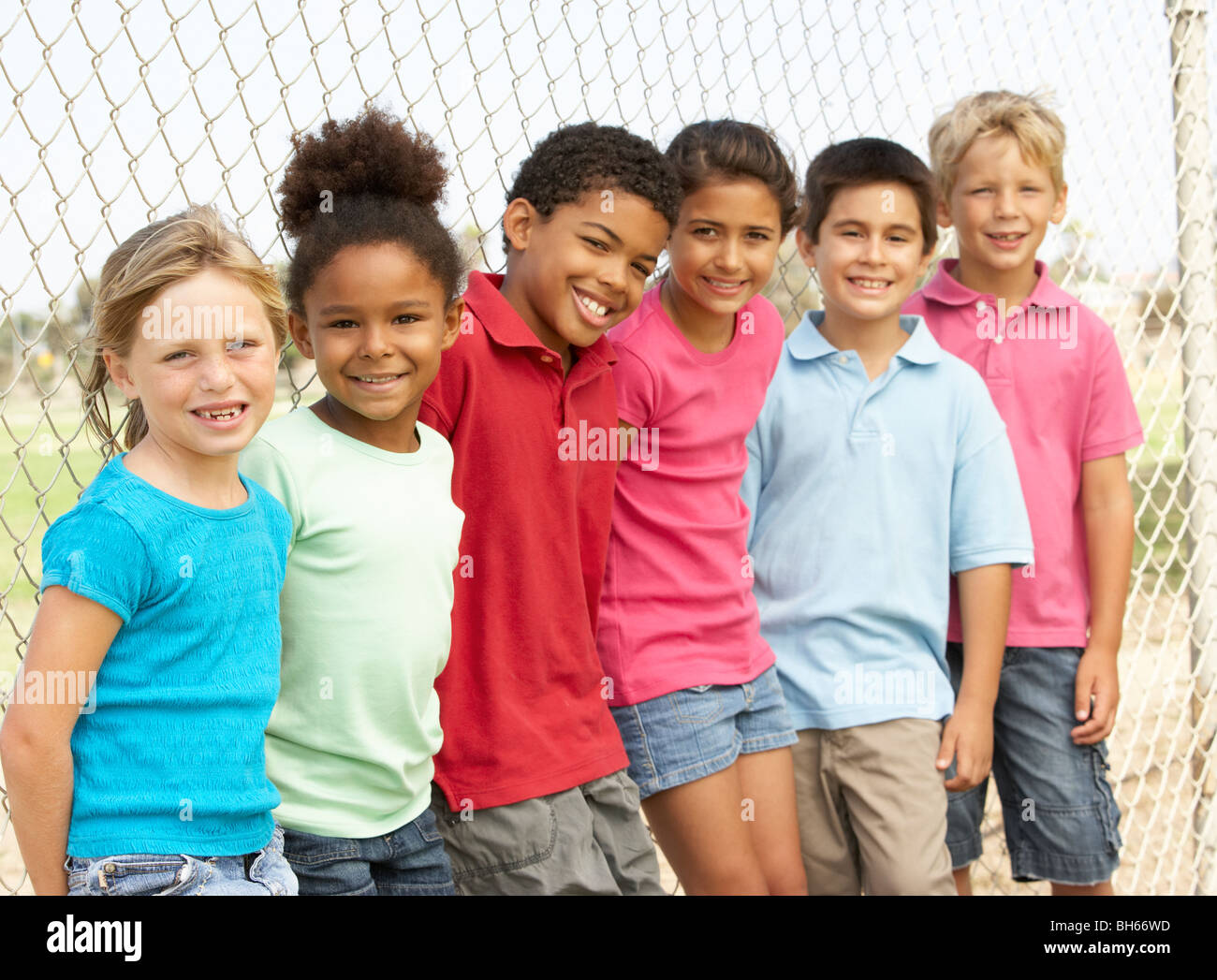 Group Of Children Playing In Park Stock Photo - Alamy