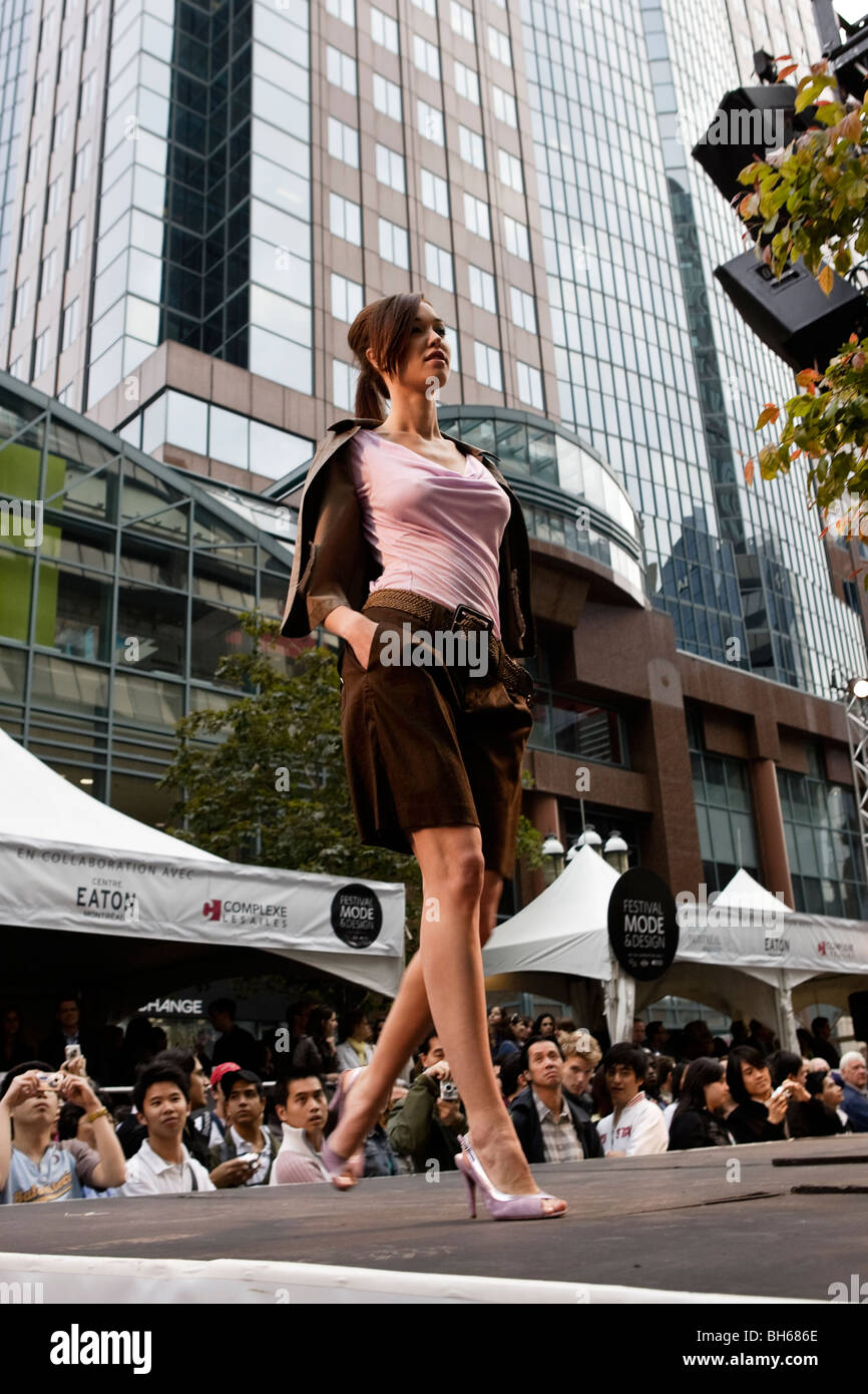 A female model walks the cat walk during a show at the Montreal Fashion ...