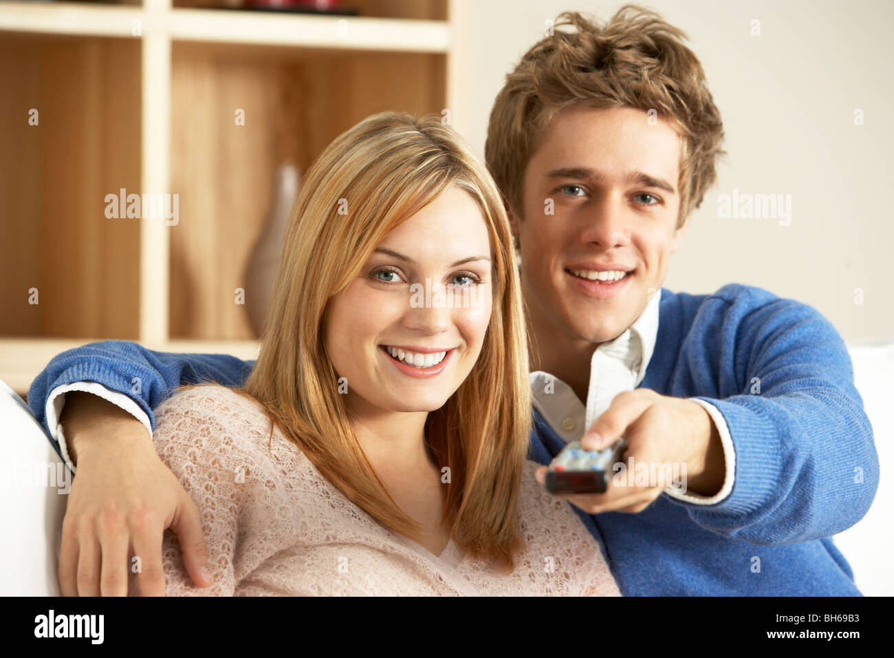 Young Couple Watching Television Together Stock Photo - Alamy
