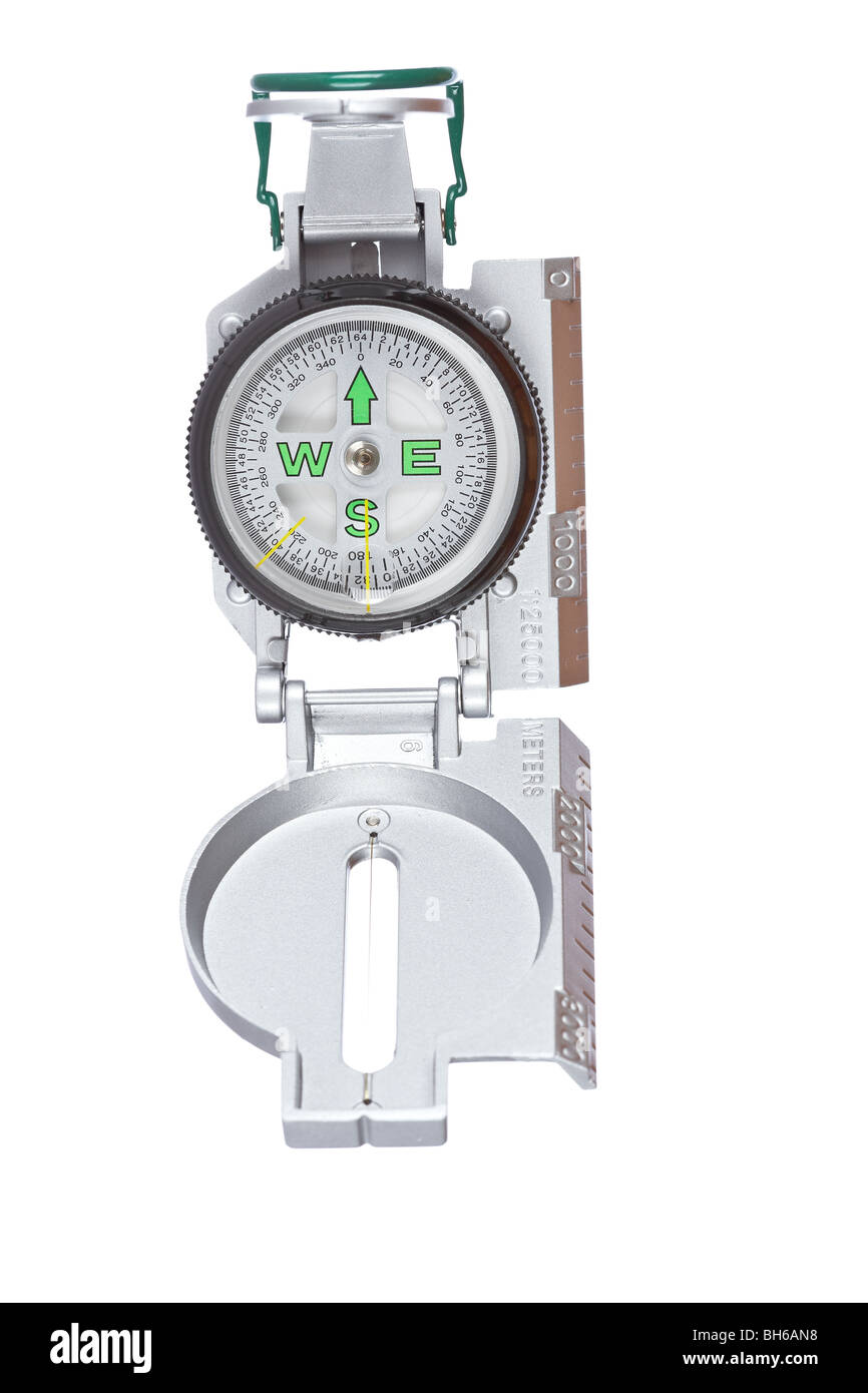Compass with focus on the south over a white background. Shallow depth ...