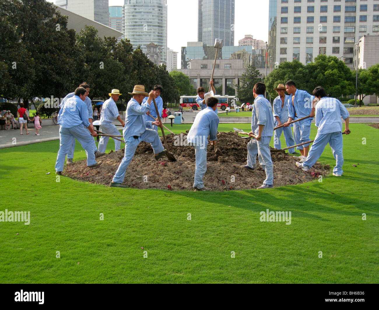Workers digging in Shanghai, China Stock Photo - Alamy