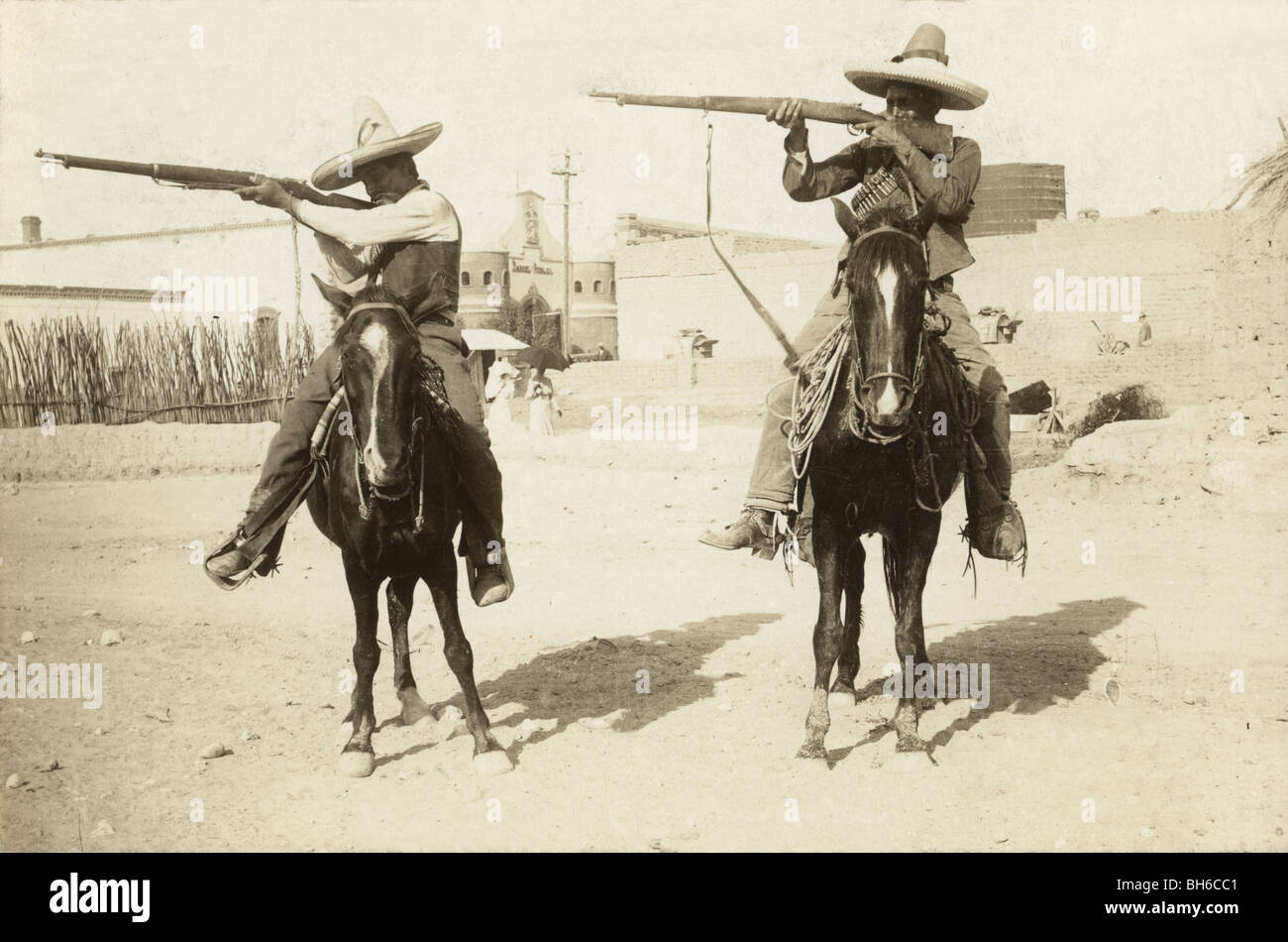 Two Mexican Revolution Cavalrymen Aiming Rifles Stock Photo - Alamy