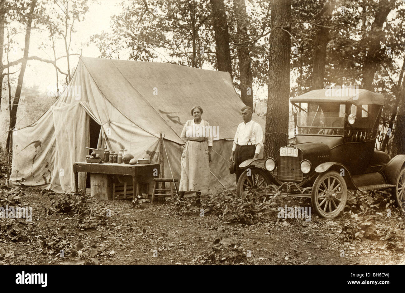 Older Couple Camping with Old Automobile Stock Photo - Alamy
