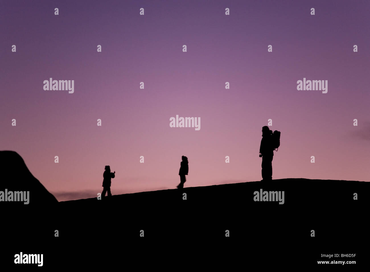 Family gathering after Sunset Stock Photo - Alamy