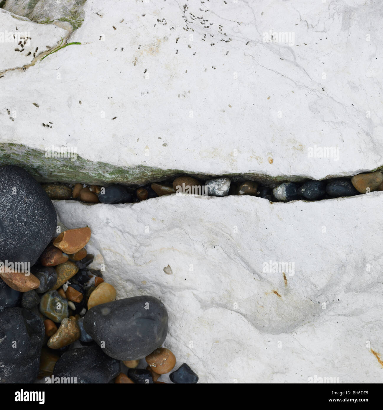 pebbles in chalk crack Stock Photo - Alamy