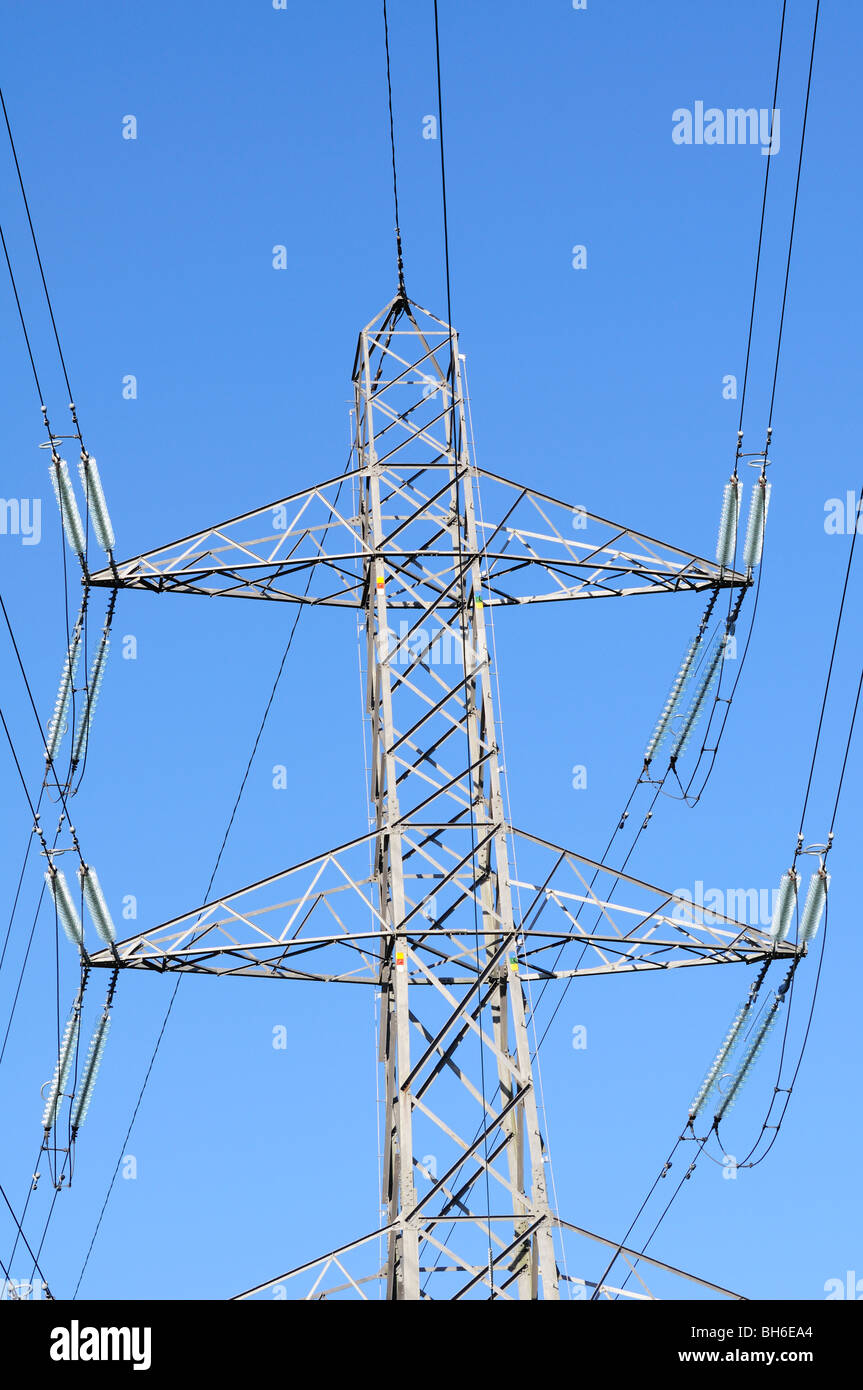 UK National Grid Electricity pylon and blue sky Stock Photo - Alamy