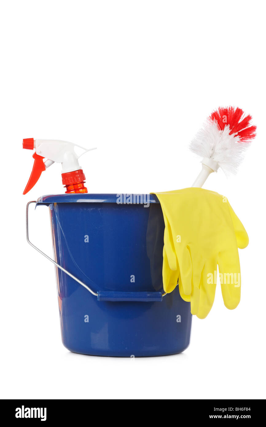 Cleaning tools in a plastic bucket over a white background. Shallow ...
