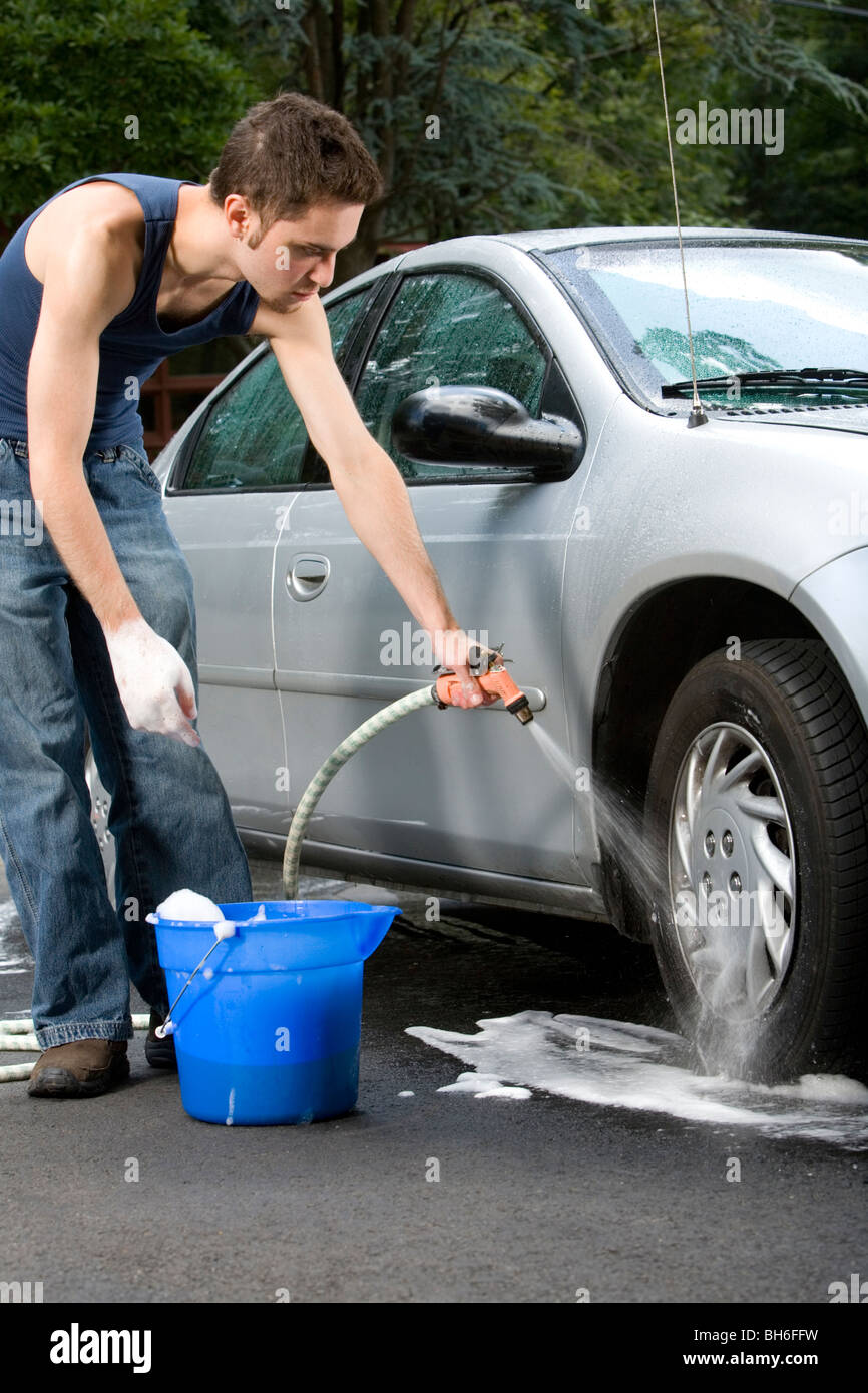 Man washes his car Stock Photo - Alamy
