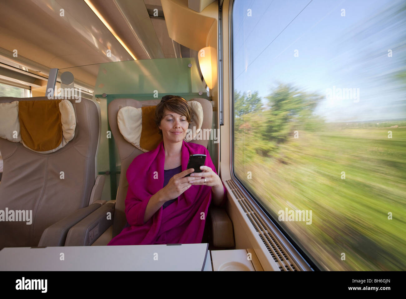 A woman on train Stock Photo - Alamy