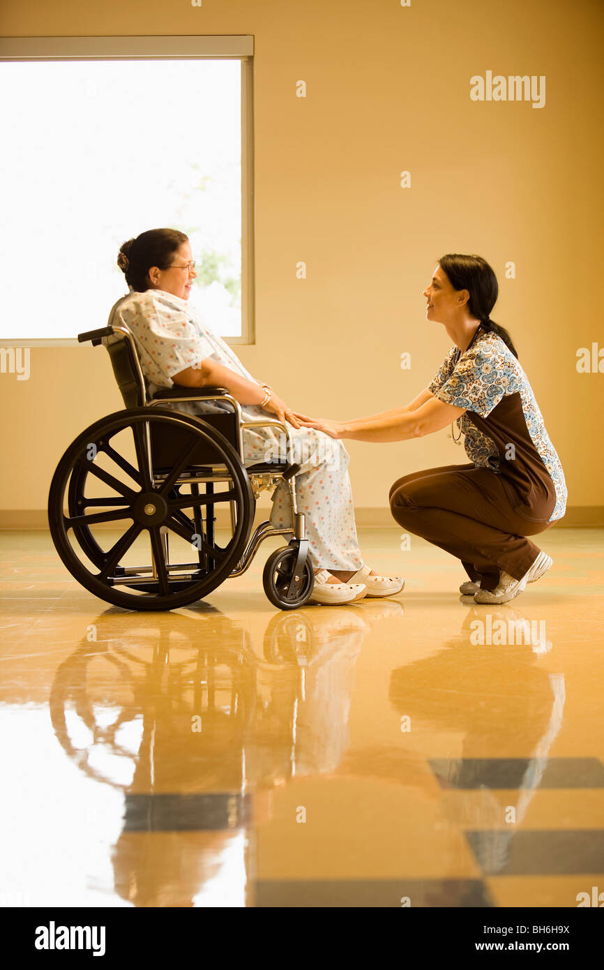 Wheelchair patient in hospital Stock Photo - Alamy
