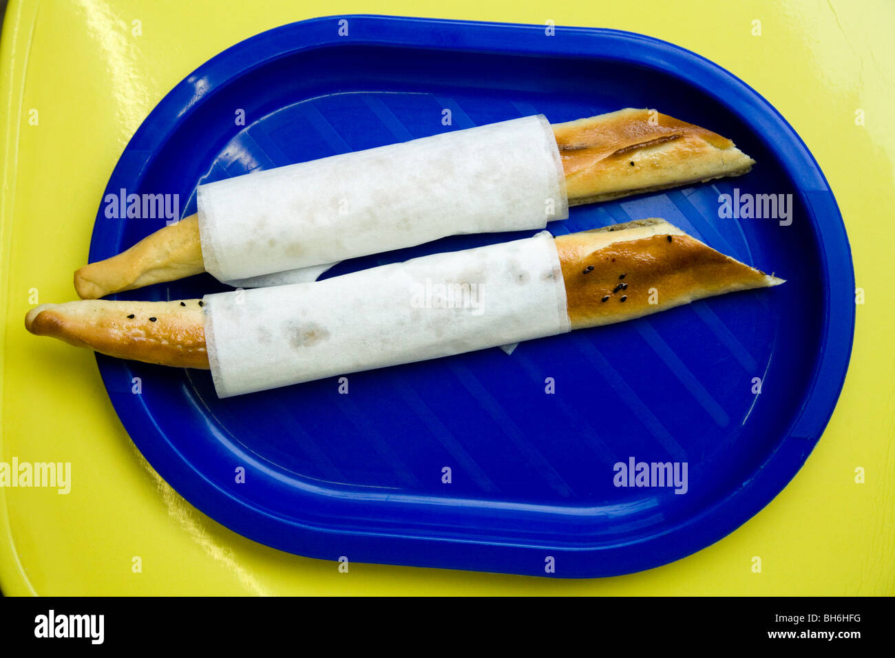 A serving of Polish Pierog (served with mushrooms) bread stick sandwich ...