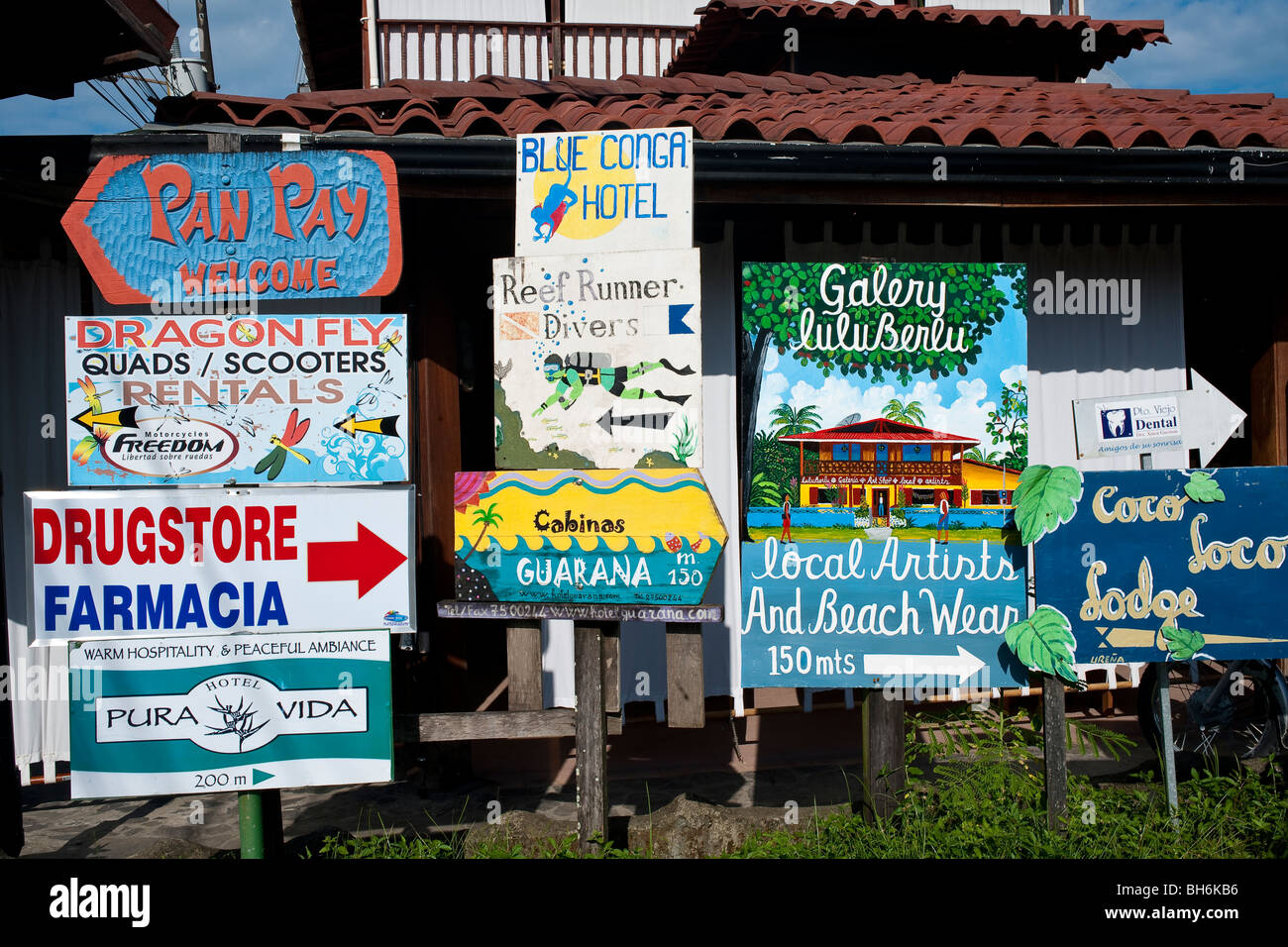 Tourist signs near the beach at Puerto Viejo, Costa Tica Stock Photo ...