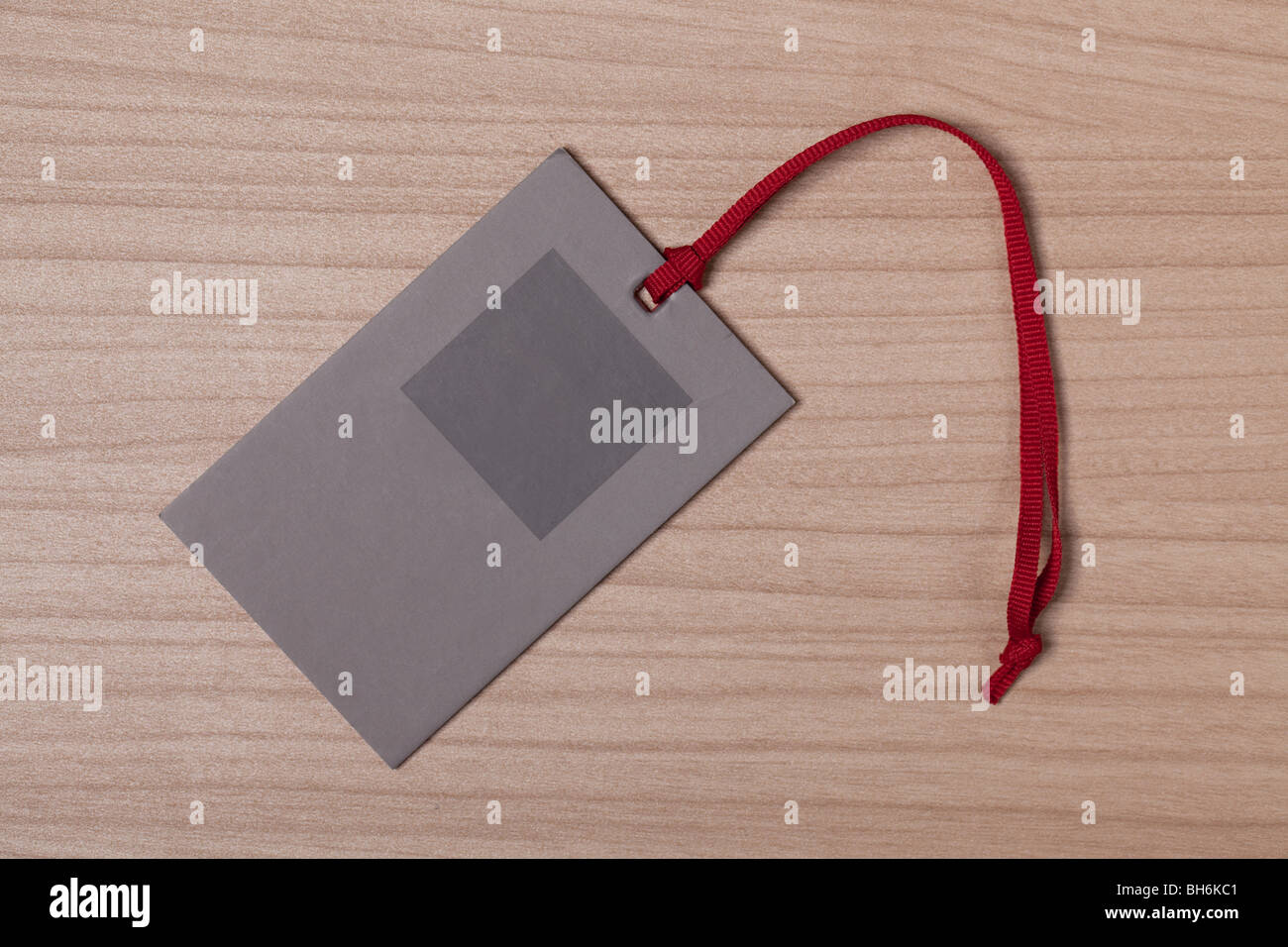 blank price tag on wooden table Stock Photo - Alamy