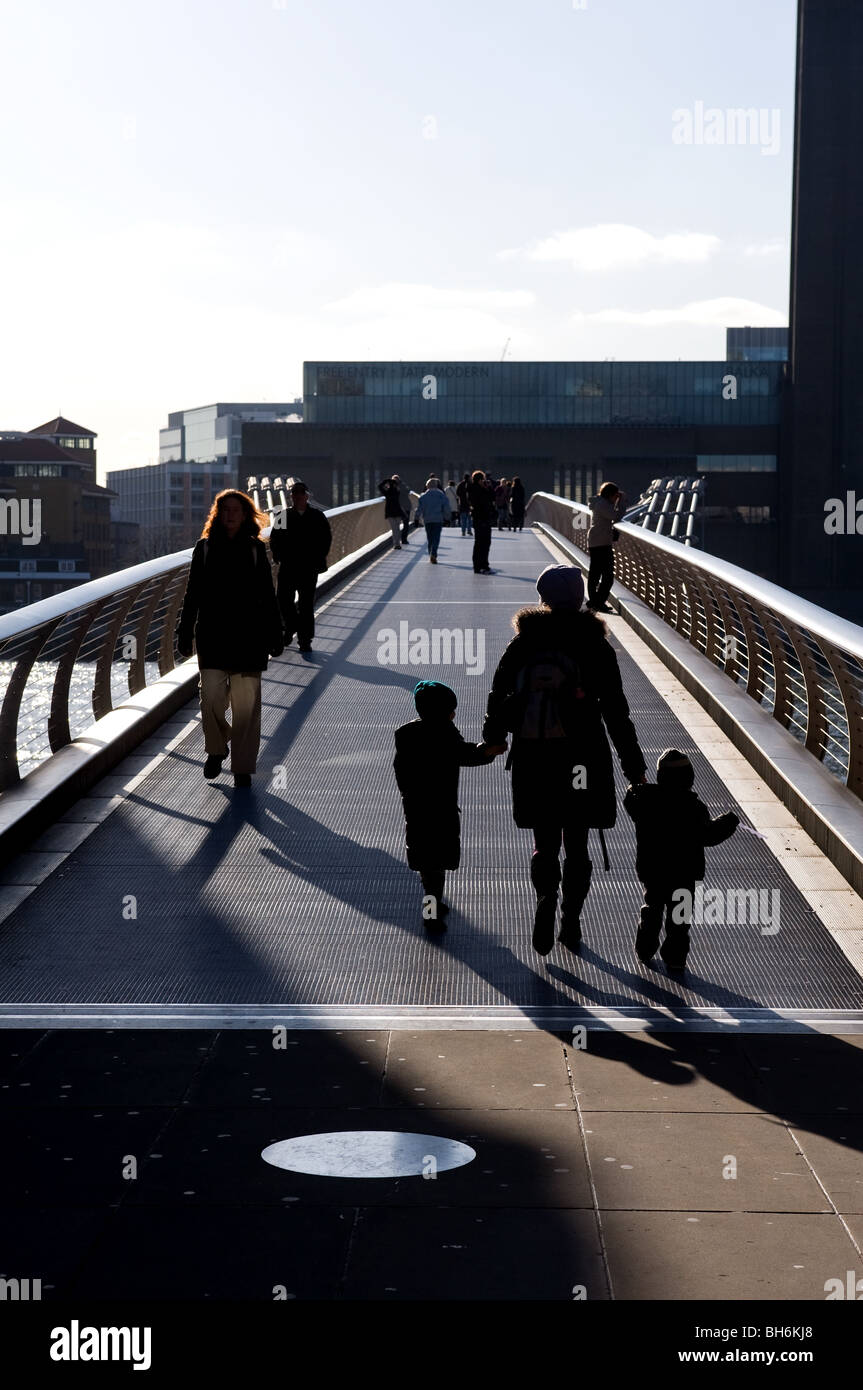 Silhouette two people walking bridge High Resolution Stock Photography ...