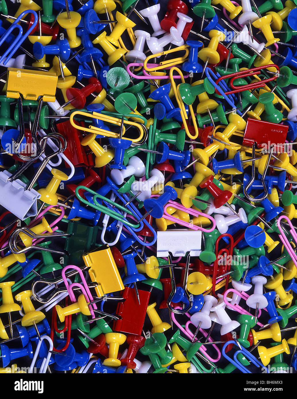 Colorful jumble of stationary items Stock Photo - Alamy