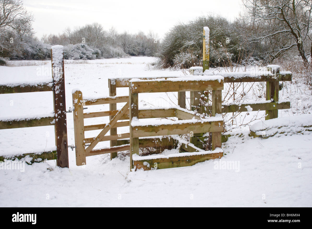 snowy scene winter fences and gate Stock Photo - Alamy